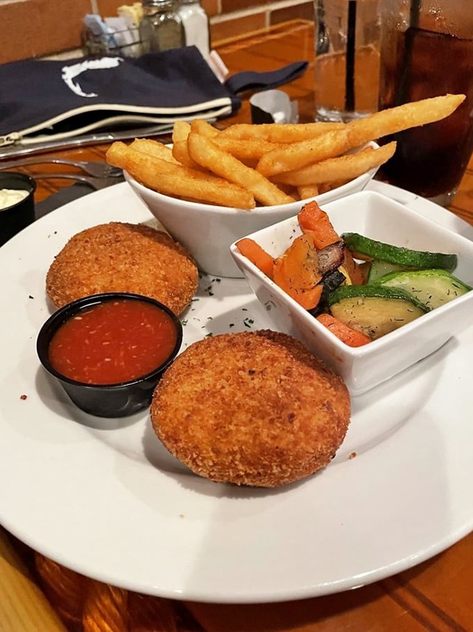 These crab cakes look like they've taken a vow to contain as little filler as physically possible—a noble commitment to crab purity.