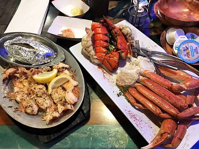 When the seafood platter arrives, conversation stops and photography begins – lobster, crab legs, and shrimp stealing the spotlight.