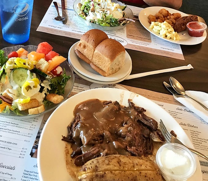 A table spread that would make your grandmother proud. That roast beef isn't just a meal—it's an edible hug served with a side of nostalgia.