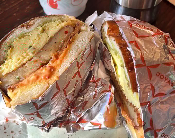 The cross-section reveals the sandwich's soul—layers of flavor in perfect harmony. Like seeing the geological strata of Delicious Mountain.