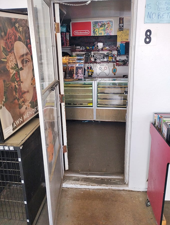 Peek through doorway number 8 and discover gaming nirvana. This vendor knows their Nintendo from their Xbox—geek treasures await inside!