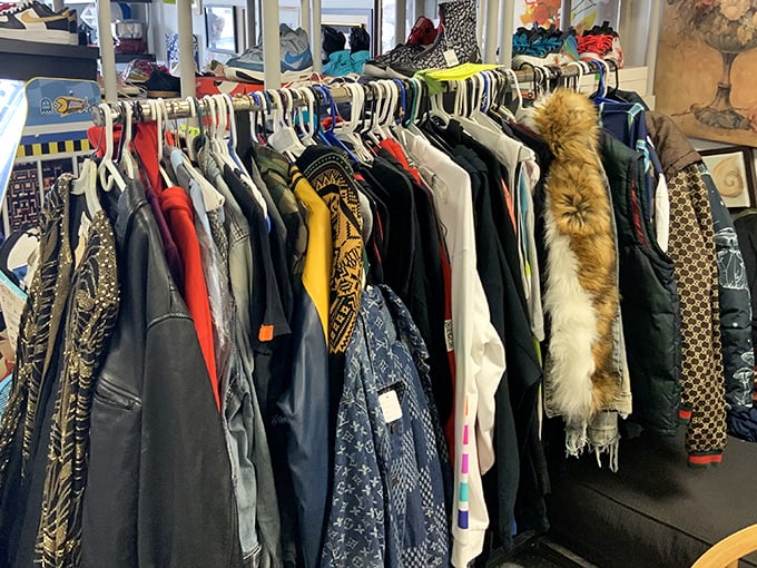 The clothing rack – where vintage leather meets fur trim and patterns that tell stories of decades past, waiting for their second act.