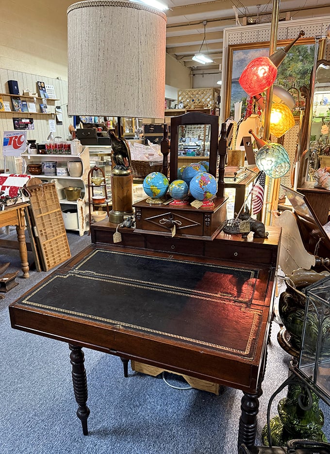 A desk that's witnessed more history than C-SPAN, paired with globes for the worldly scholar. Someone's study is about to get exponentially cooler.
