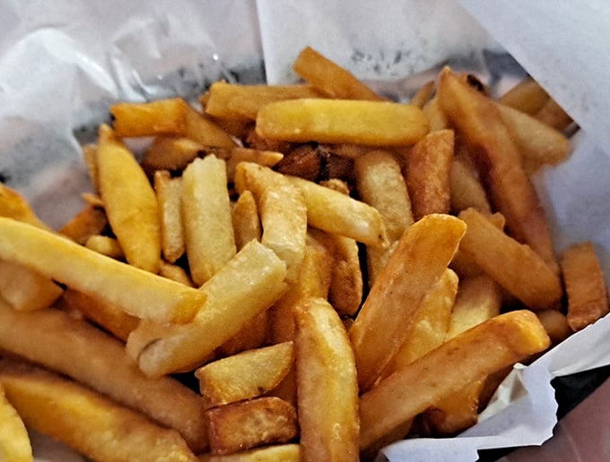 These aren't just french fries; they're supporting actors deserving of their own spotlight—crispy, golden, and unapologetically straightforward.