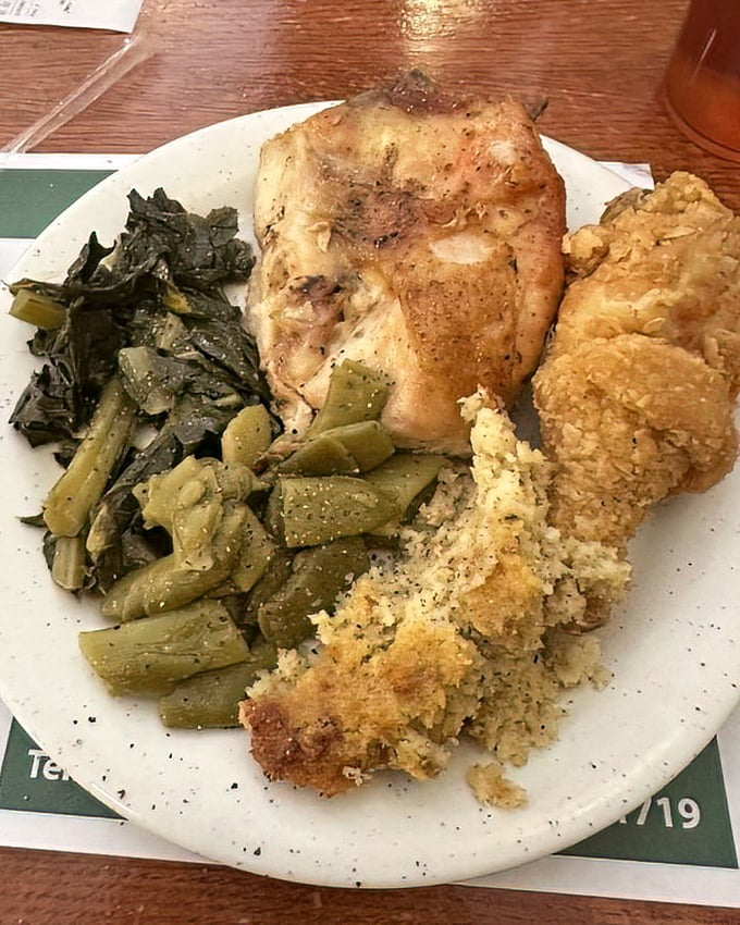 Southern cooking in its full glory—tender chicken, collard greens, and cornbread dressing that would make any grandmother nod in approval.