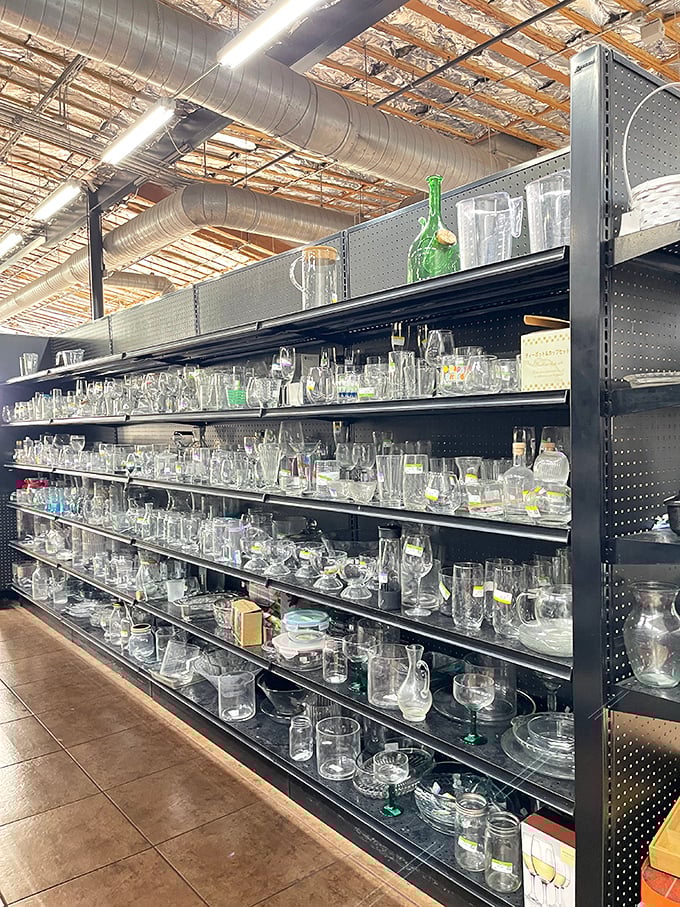 Handbag heaven or purse purgatory? This wall of accessories proves that yesterday's fashion statements are today's bargains waiting for the right shoulder.