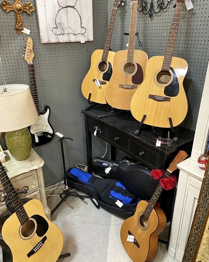 A guitar collector's dream corner. These acoustic beauties are just waiting to play their next chorus of "Wonderwall" or "Free Bird."