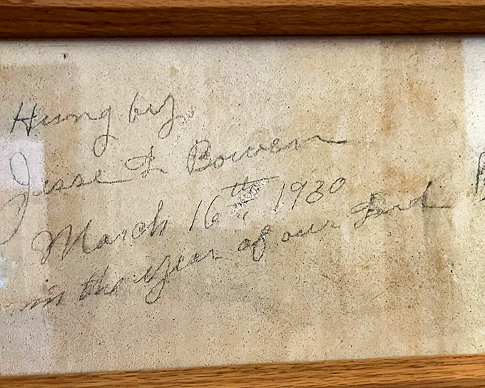 Handwritten history from 1920 preserved on the wall—a century-old graffiti that's now a treasured artifact rather than vandalism. Time changes everything!