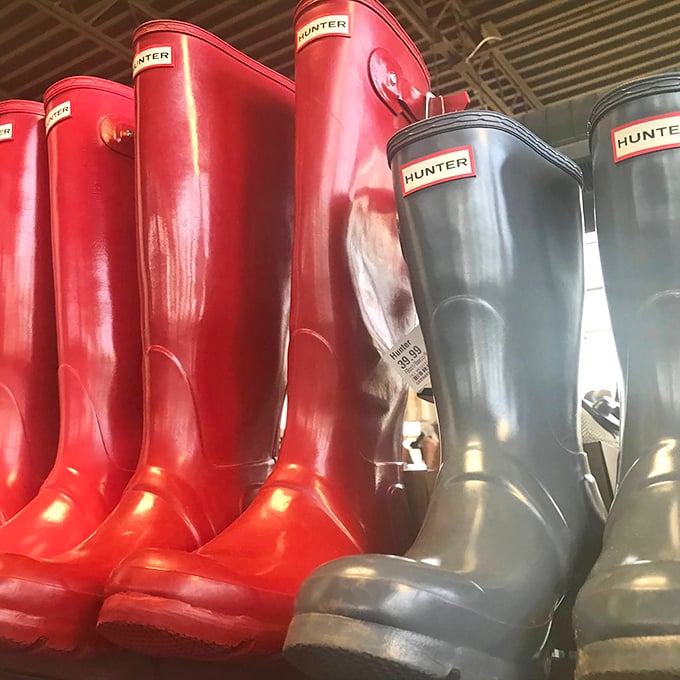 Hunter boots standing at attention like colorful soldiers, ready to march through puddles without emptying your wallet.