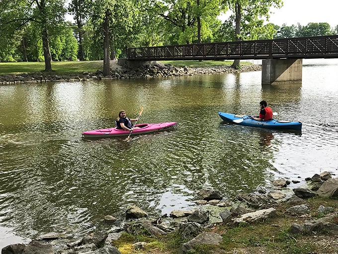 Colorful kayaks and a picturesque bridge. Water adventures here come with bonus scenery that makes even beginners look like pros.