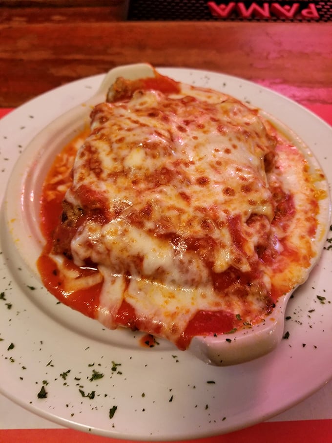 Lasagna that rises from the plate like the Italian food pyramid it is—layers of pasta, cheese, and sauce in perfect architectural harmony.