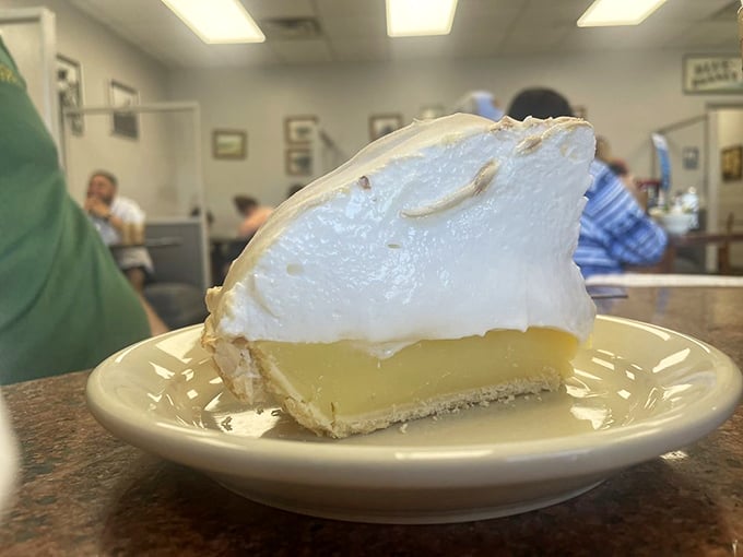 Lemon meringue pie with peaks so high they need their own zip code. The perfect balance of sweet and tart in every heavenly bite.