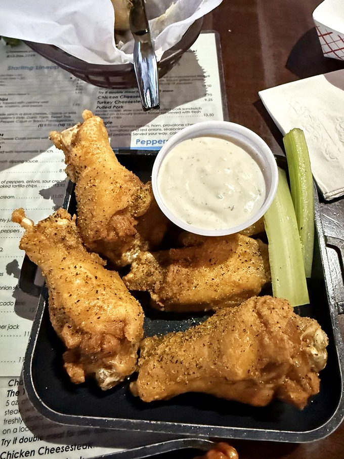 Wings so perfectly fried they'd make Buffalo nervous. Paired with cool ranch dressing, they're the ultimate game day companion.