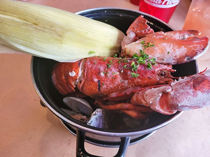 The legendary Lobster Pot—where lobster goes for its spa treatment with mussels and corn. It's not a meal; it's an underwater reunion party.