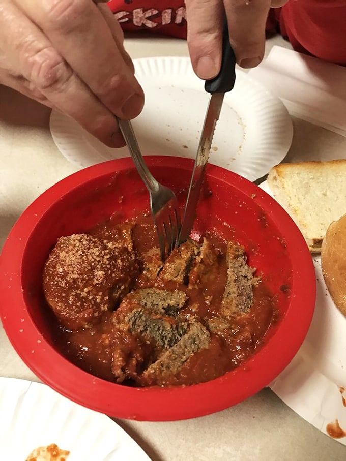 These meatballs aren't just food; they're time machines—each bite transporting you to Sunday dinners at your Italian grandmother's house, even if you never had one.