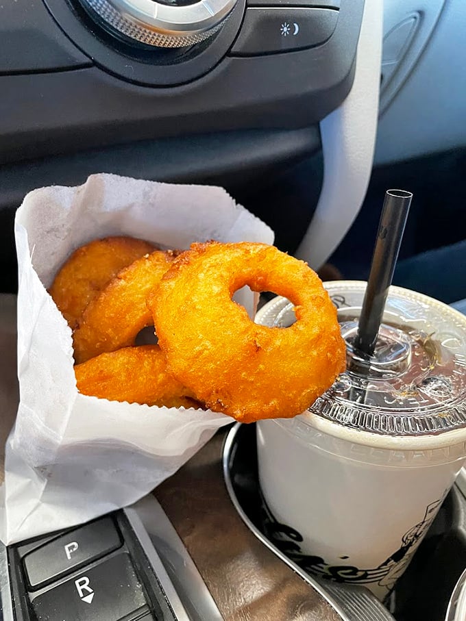 Onion rings so magnificent they deserve their own documentary series about achieving perfect golden-brown enlightenment through deep frying.