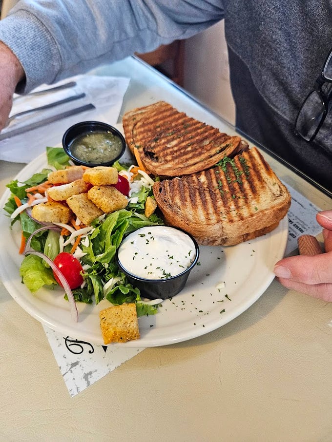This sandwich plate isn't just lunch – it's edible therapy served with a side salad and enough croutons to make you believe in happiness again.
