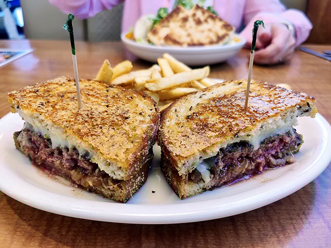 The patty melt – that glorious intersection where burger meets grilled cheese, creating what might be the most satisfying sandwich in the universe.