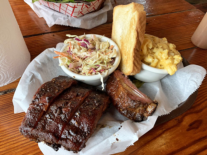 These ribs don't need a fancy introduction—they're the celebrities of the plate. The mac and cheese and slaw are just their entourage.