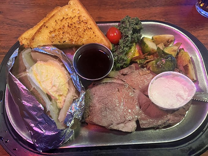 Prime rib that doesn't need a special occasion, served with vegetables that actually taste like vegetables and a baked potato that's practically a meal itself.