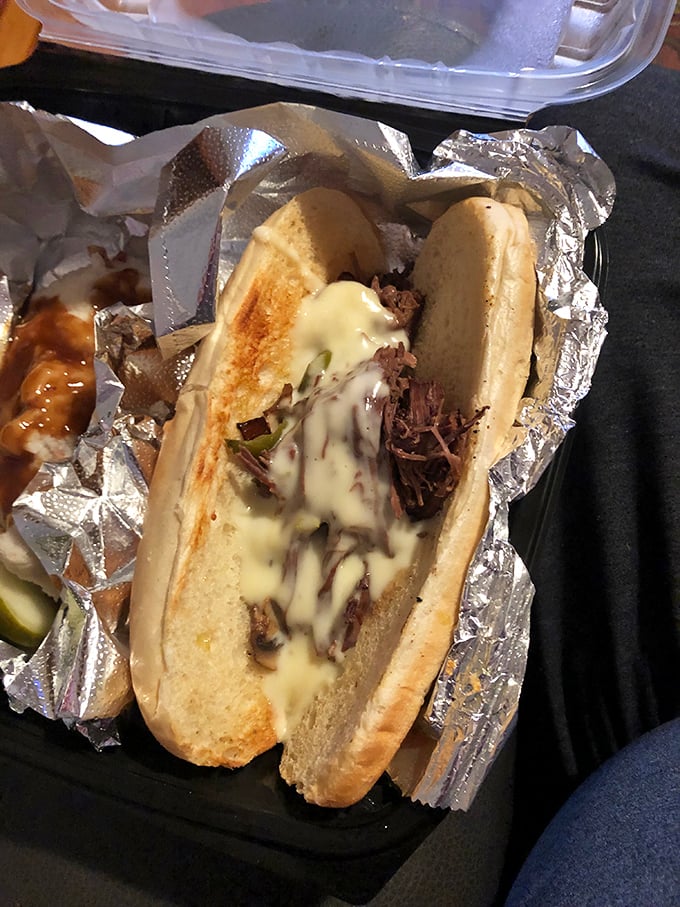 A pulled pork sandwich that's achieved that perfect meat-to-cheese ratio. The kind of sandwich that demands a moment of silent appreciation.