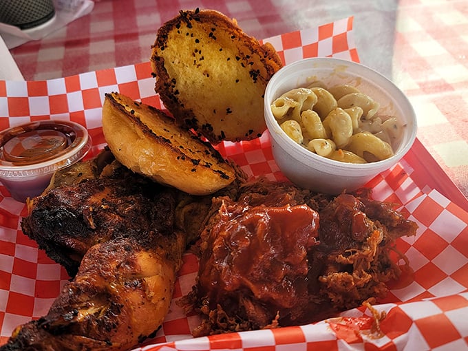 When chicken and pulled pork share a plate with Texas toast and mac and cheese, it's not just a meal—it's a summit meeting of comfort foods.