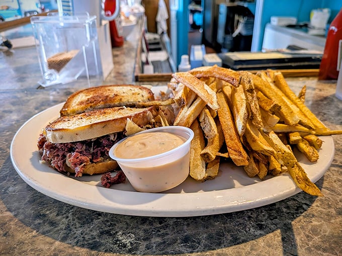 This pulled pork sandwich with hand-cut fries isn't just lunch – it's edible therapy that makes Monday meetings seem almost bearable.