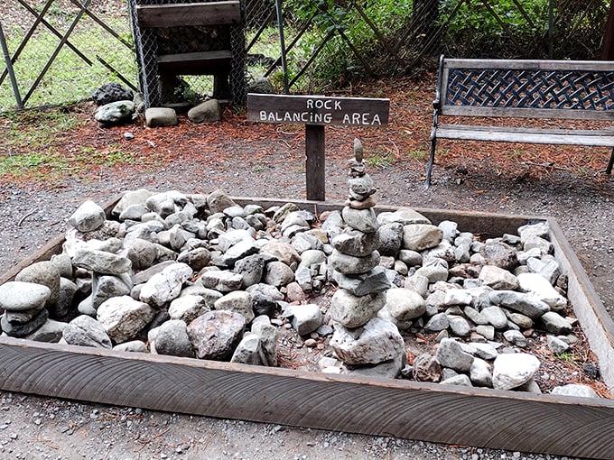 The rock balancing area invites visitors to test their patience and steady hands – a meditative break from the roadtrip chaos.