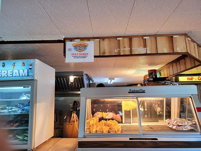 The concession stand—where movie theater popcorn reaches its buttery, salty pinnacle of perfection. Diet tomorrow, indulge tonight!
