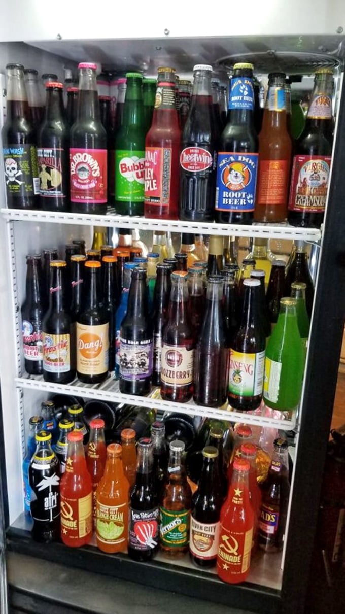 The soda selection rivals a candy store's color palette. These aren't just beverages—they're liquid nostalgia in glass bottles, each promising a unique fizzy adventure.