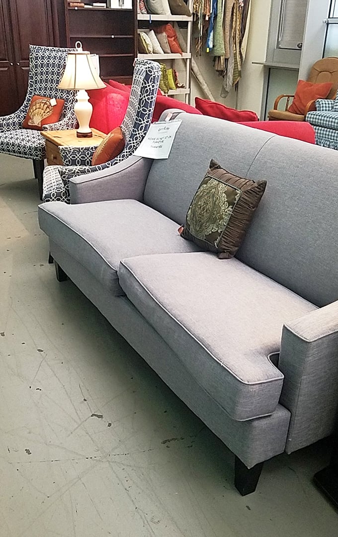 This elegant gray sofa isn't just a place to sit—it's the starting point for your living room's redemption story at a fraction of retail prices.