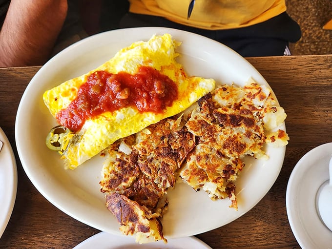 This omelet has more layers than your favorite Netflix drama, with each bite revealing new flavor combinations.