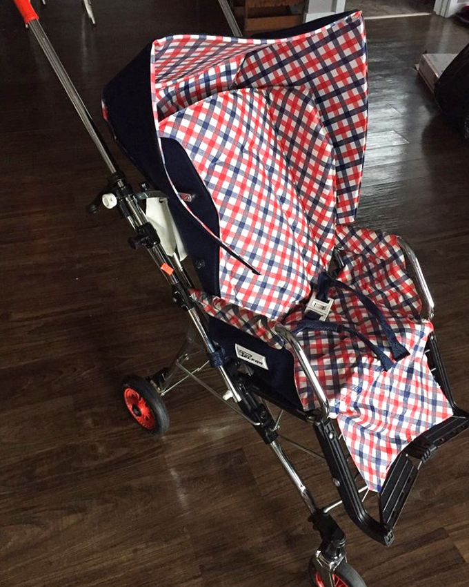 This red-checkered stroller has stories to tell. One family's outgrown treasure becomes another's practical find.