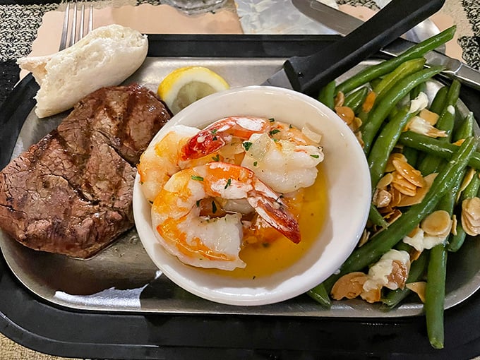 The ultimate land-and-sea alliance: tender steak, buttery shrimp, and green beans almondine. Diplomacy never tasted this good.