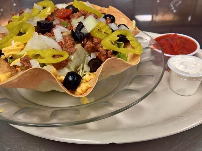 A taco salad that refuses to be a boring health food – crispy, colorful, and served with enough toppings to qualify as a complete food group.