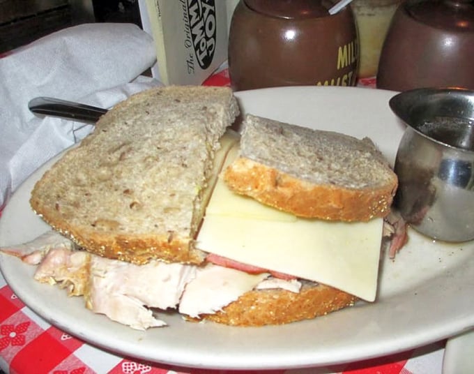 This sandwich isn't playing hard to get—it's an honest stack of turkey and bread that reminds you why simple food done right never goes out of style.