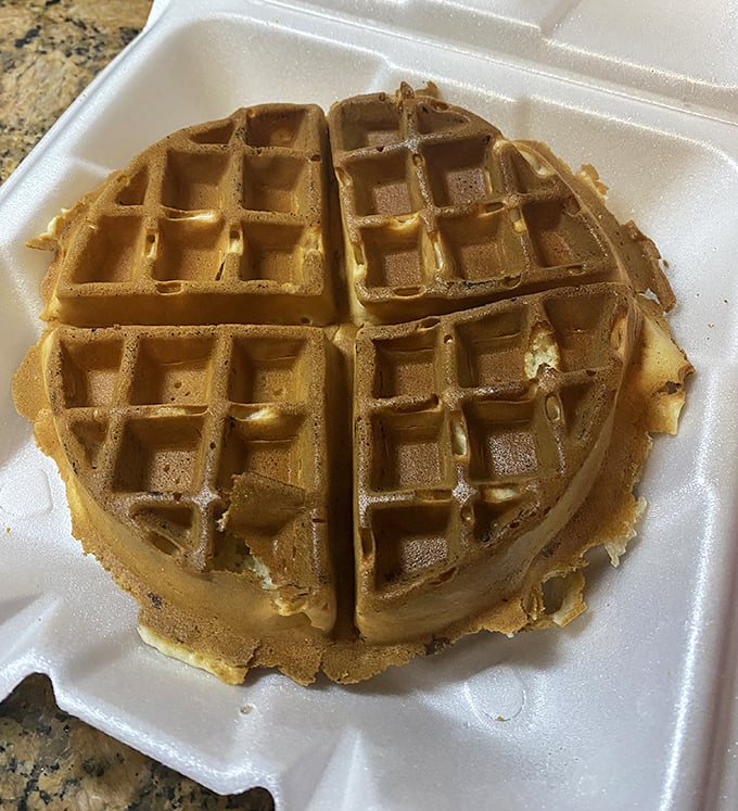 This golden waffle isn't just breakfast – it's an edible sunbeam that brightens your morning one bite at a time.
