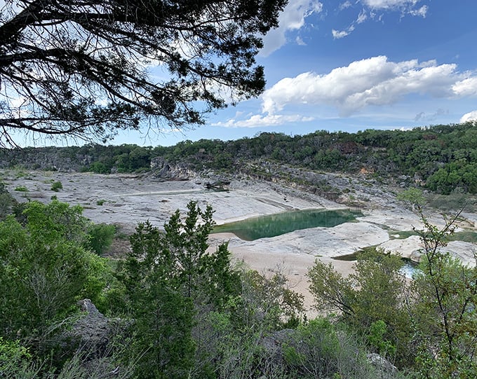 The view that launches a thousand Instagram posts. From this overlook, you can almost hear the ancient limestone whispering its geological stories.