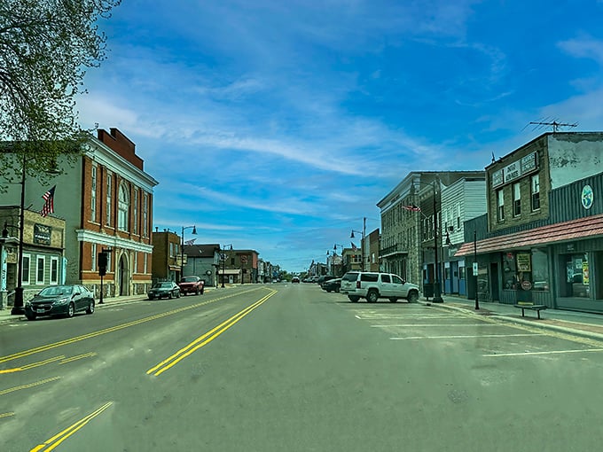 Antigo’s quiet main street stretches wide under blue skies, where everyday charm meets small-town value
