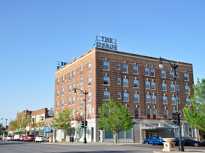 The stately Osage Hotel stands as Arkansas City's architectural crown jewel, a reminder of when traveling salesmen arrived by steam train.