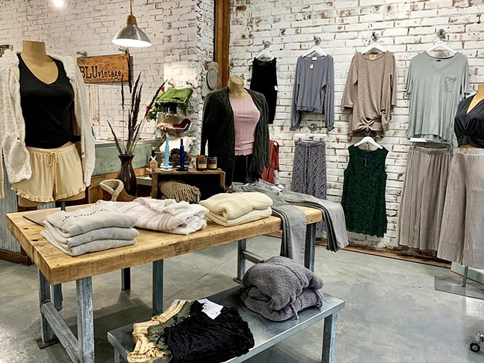 Exposed brick walls meet carefully curated clothing. BLUvintage isn't just a store—it's where yesterday's fashion finds its tomorrow.