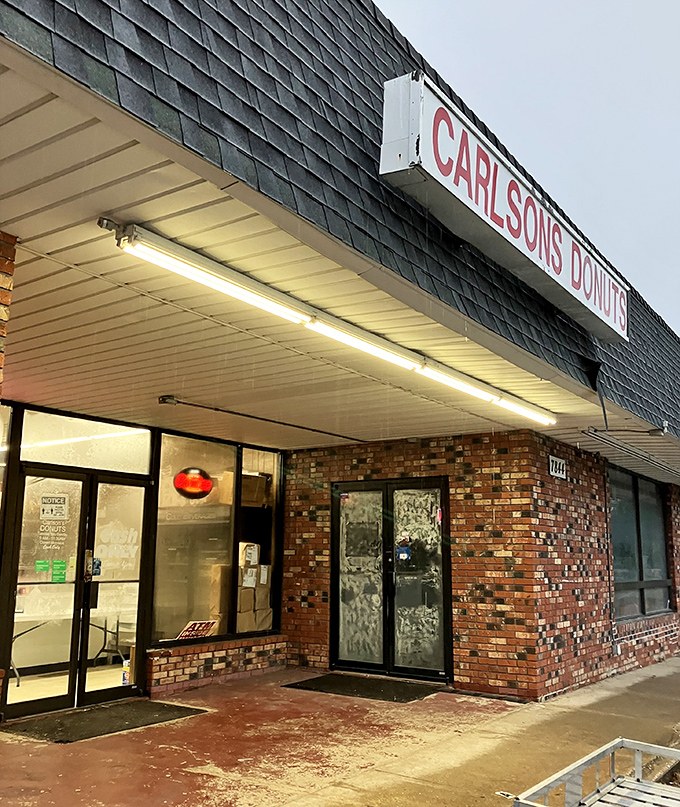 The brick exterior whispers "classic" while the donuts inside absolutely sing with old-school perfection.