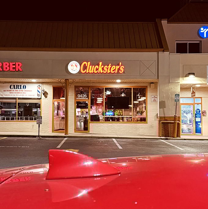 Cluckster's modest storefront hides flavor bombs within. Never judge a chicken joint by its cover – unless that cover says "Open" in neon.
