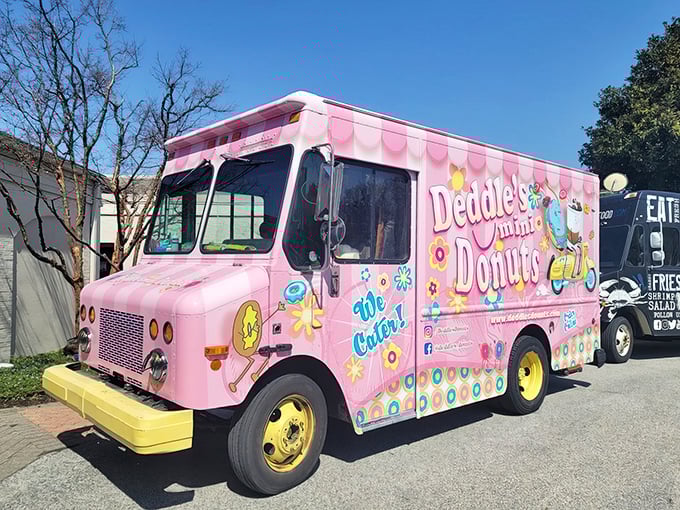 This cotton-candy-colored truck isn't just transportation – it's a mobile joy factory pumping out mini donuts that make grown adults giggle.