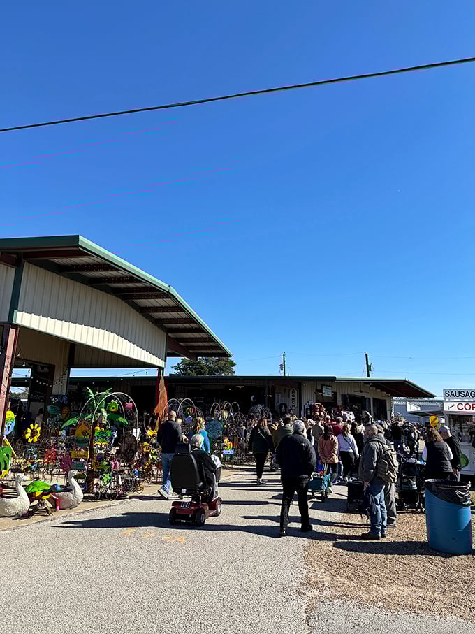 Under that blue sky, vendors create their own little kingdoms of curiosities and everyday essentials.