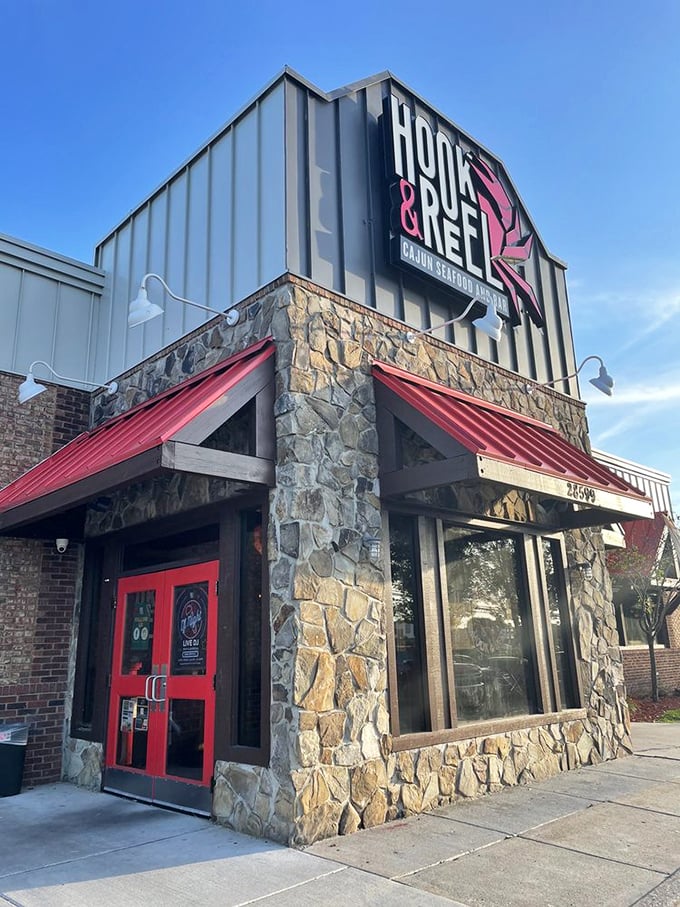 Hook & Reel's stone facade promises the kind of bold flavors that make ordinary Tuesday nights extraordinary.