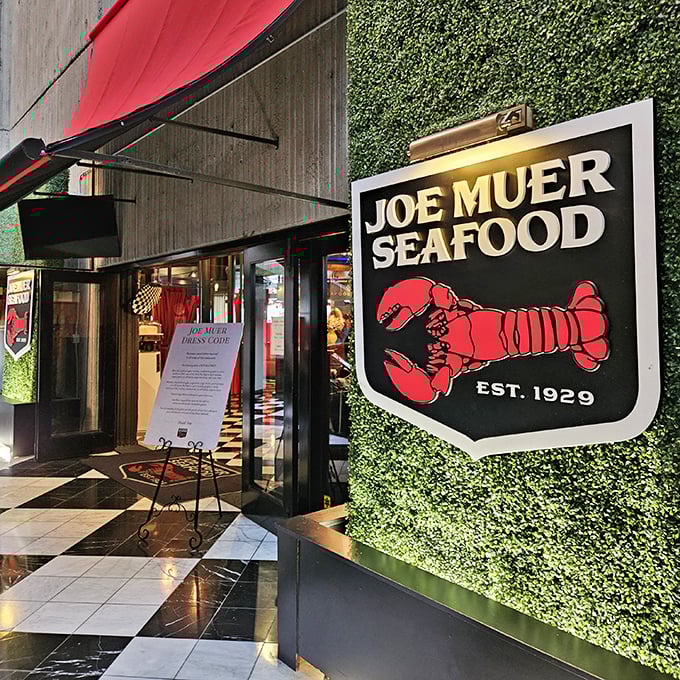 Joe Muer's iconic sign features a lobster that looks like he's dressed for a night out. Spoiler alert: so is the seafood inside.
