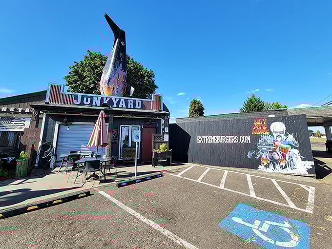 The junkyard theme embraces organized chaos, where extreme flavors and oversized portions create beautifully messy dining experiences.