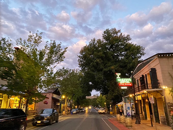 As dusk falls on Murphys, the streetlights and a cozy neon sign invite you in for a good meal.