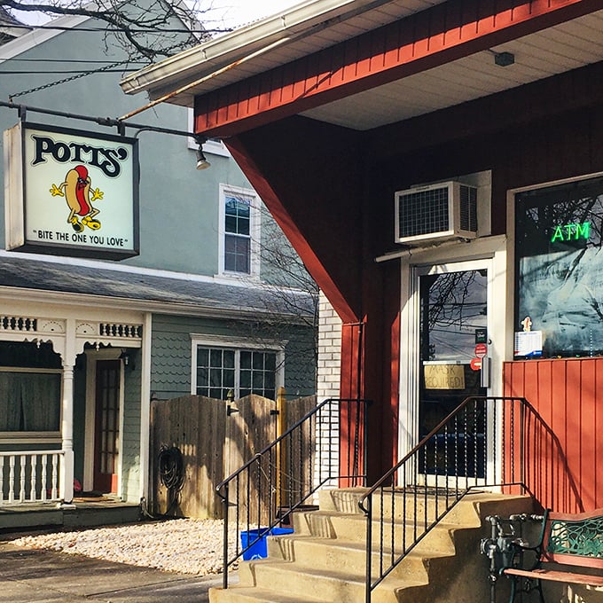 "Bite the one you love" – advice that works for both relationships and Potts' legendary hot dogs. That cartoon hot dog sign has guided hungry travelers for decades.